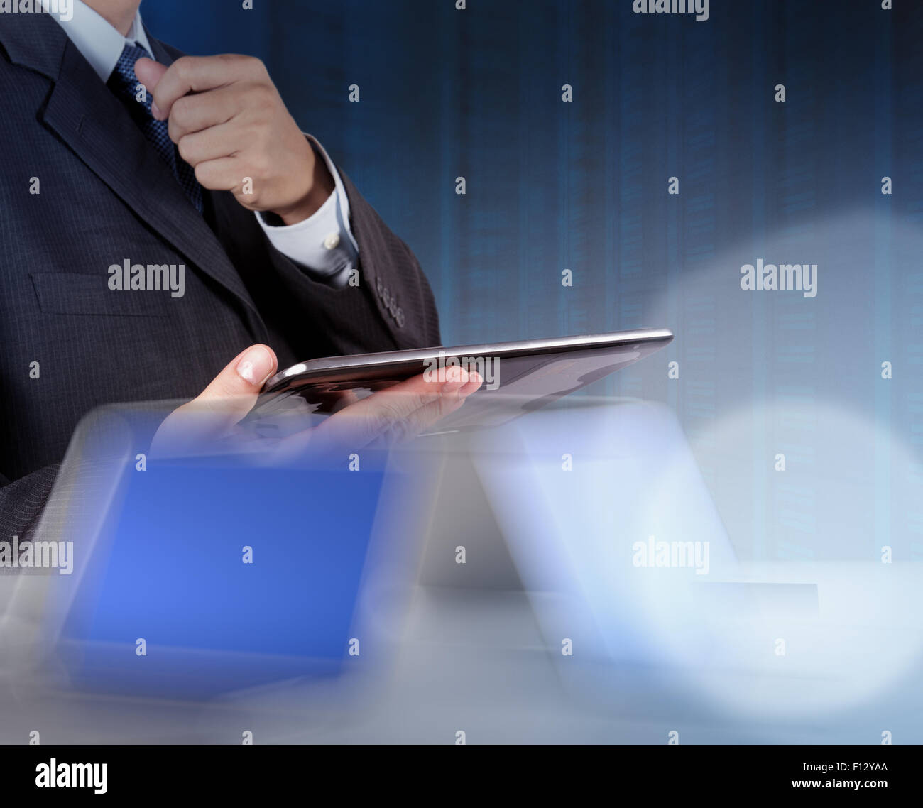 businessman hand pressing a touchscreen button on server background ...