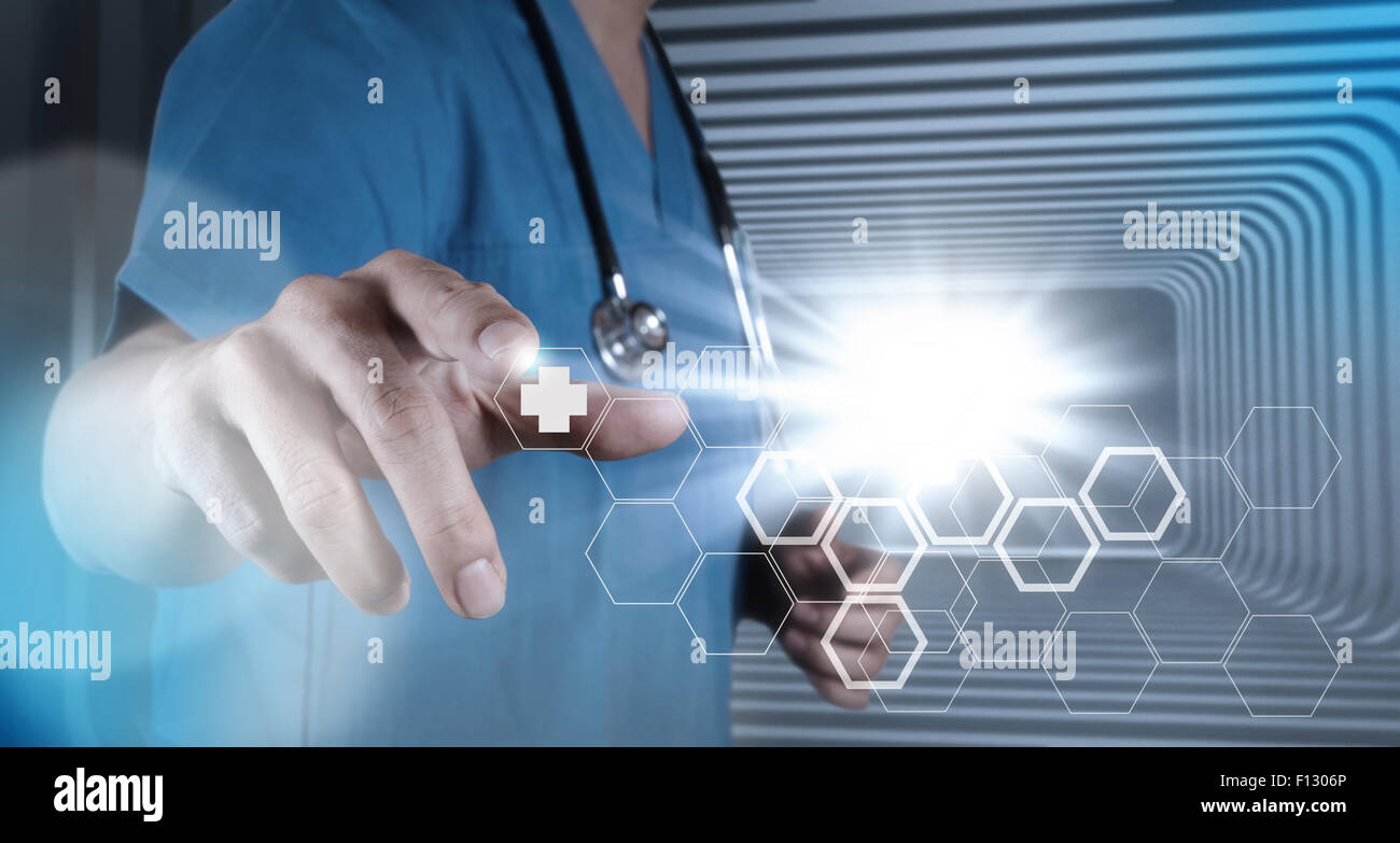 Medicine doctor hand working with modern computer interface as medical ...