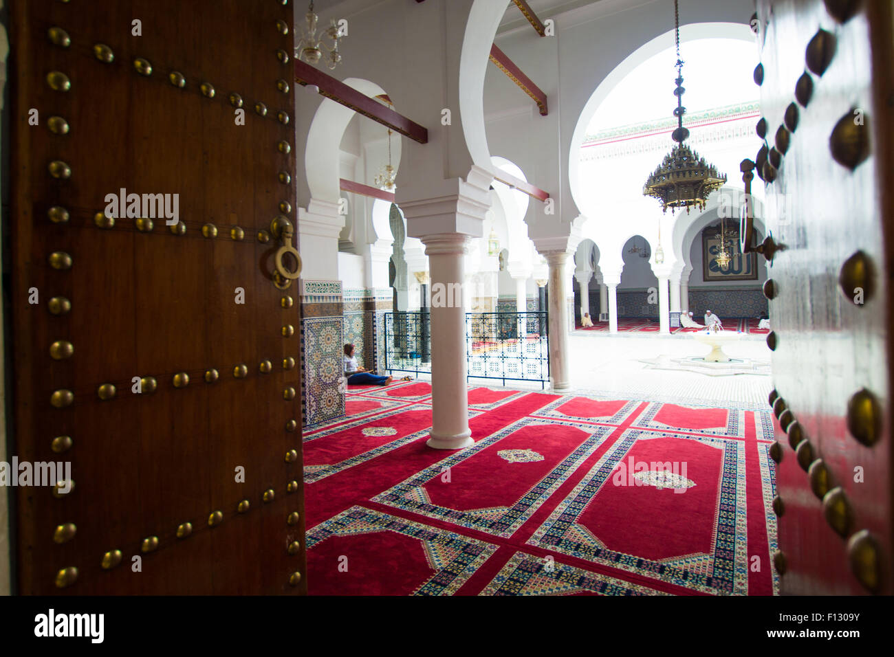 The entrance of a mosque in the Moroccan city of Fes (Fez Stock Photo ...