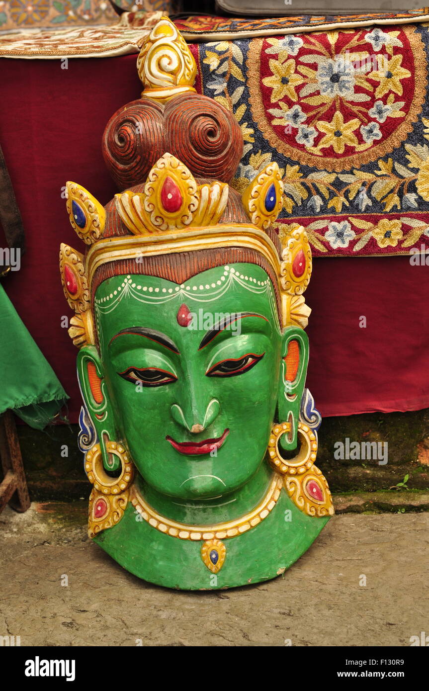Colorful cultural masks made of papier mache in the form of gods and ...
