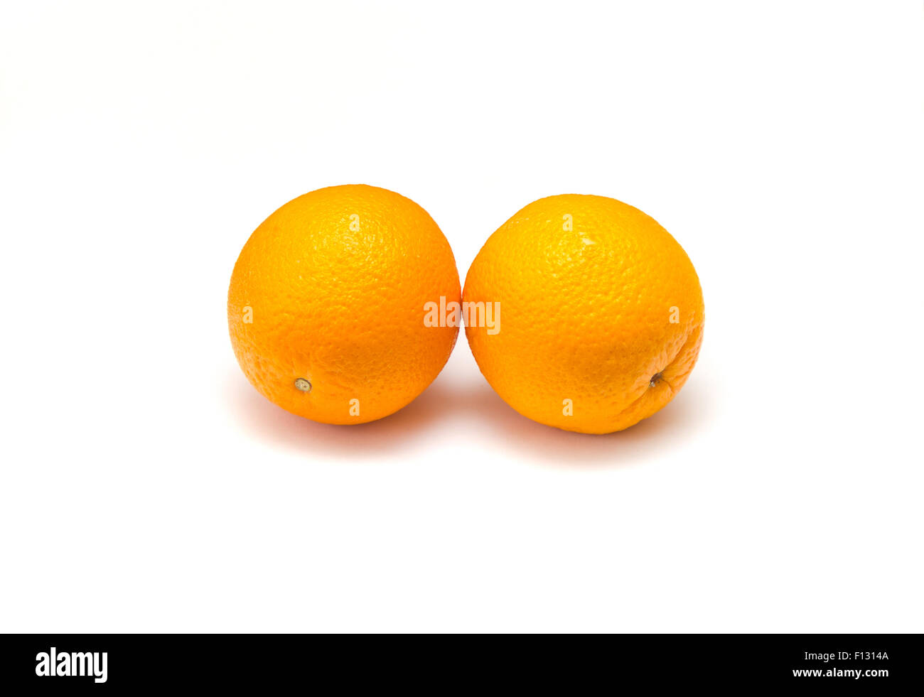 Two mandarin oranges Cut Out Stock Images & Pictures - Alamy