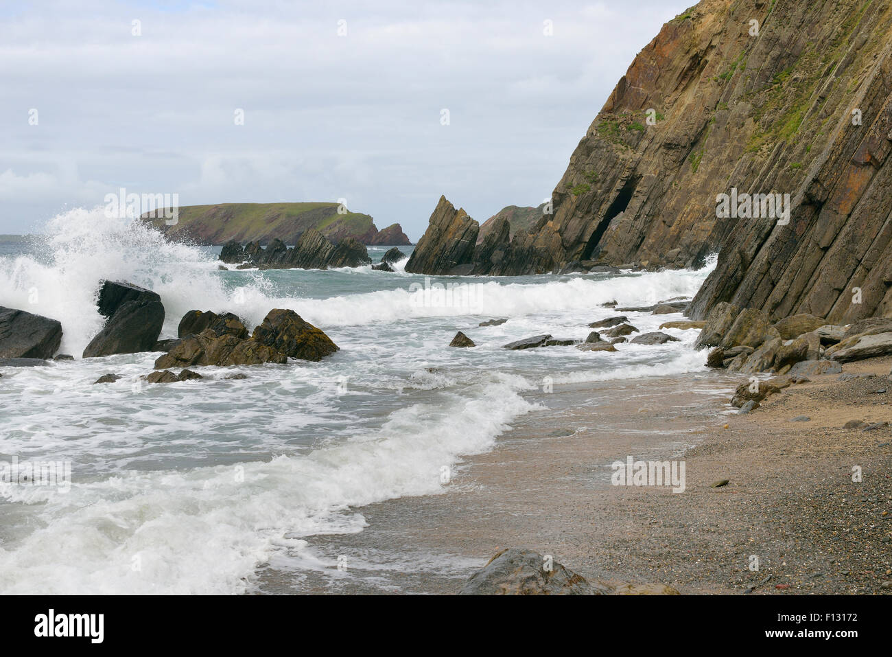 High Tide at Marloes Sands Beach with Rock Arch in vertical cliff ...