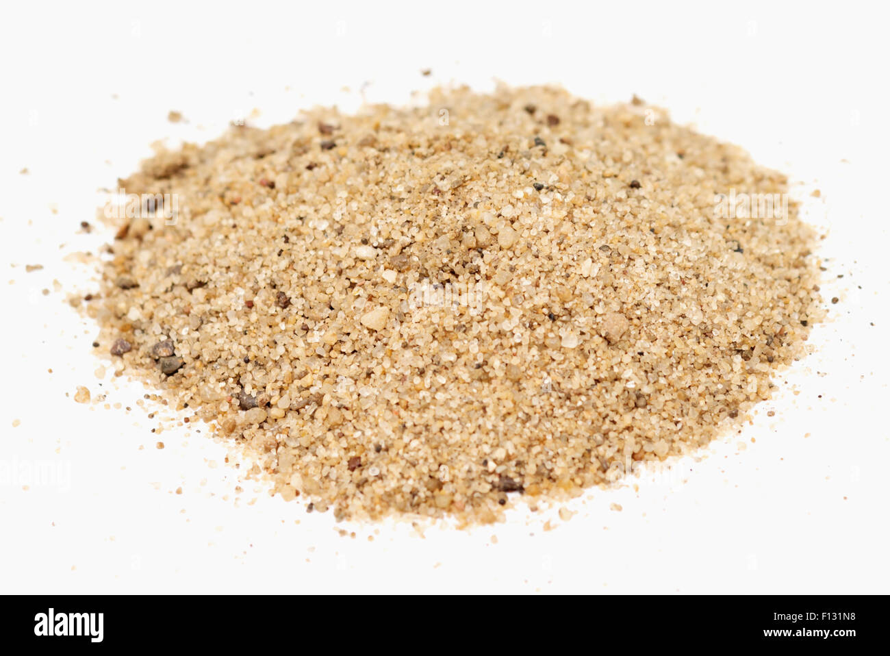 pile of sand isolated on white background Stock Photo - Alamy