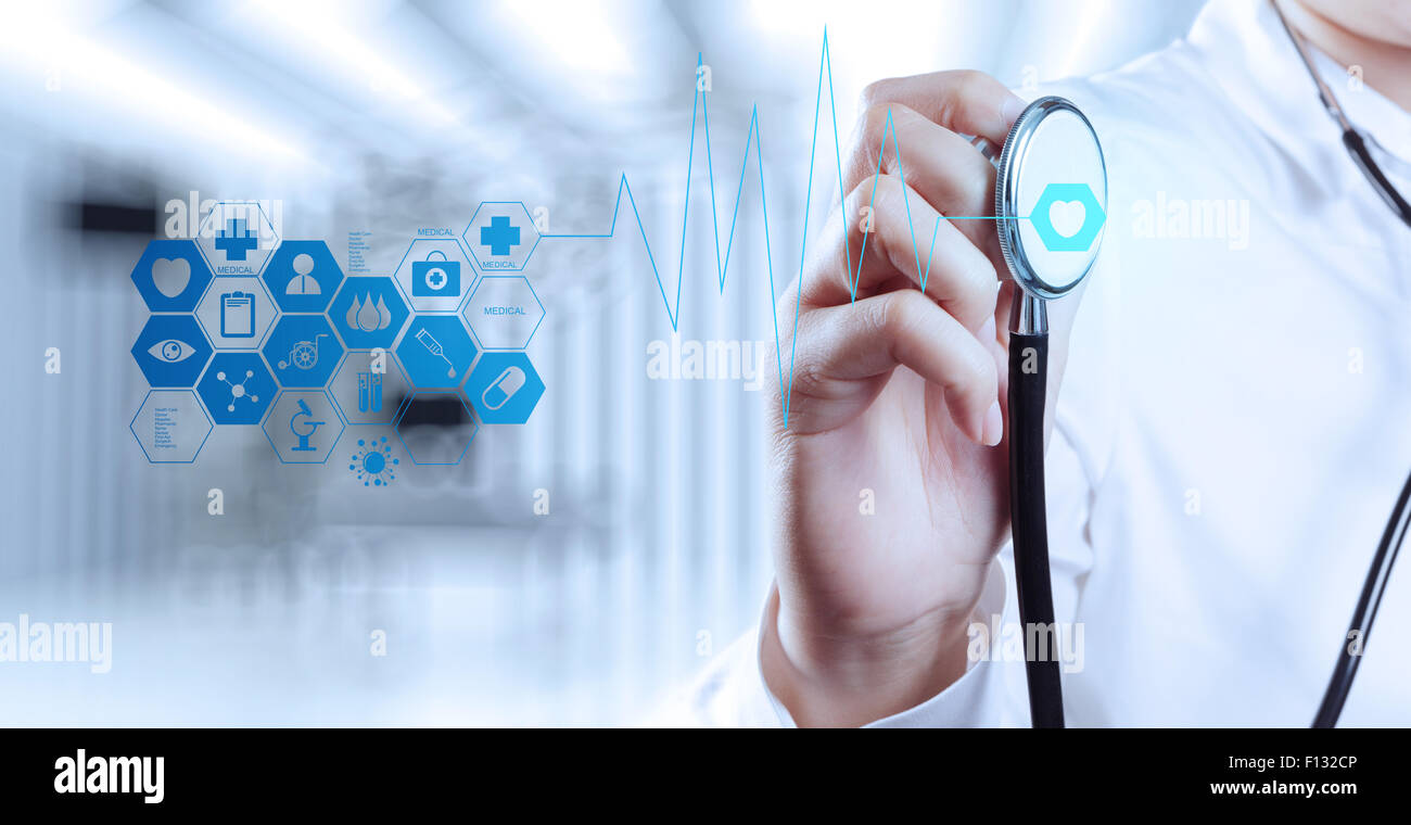 Medicine doctor hand working with modern computer interface as medical ...