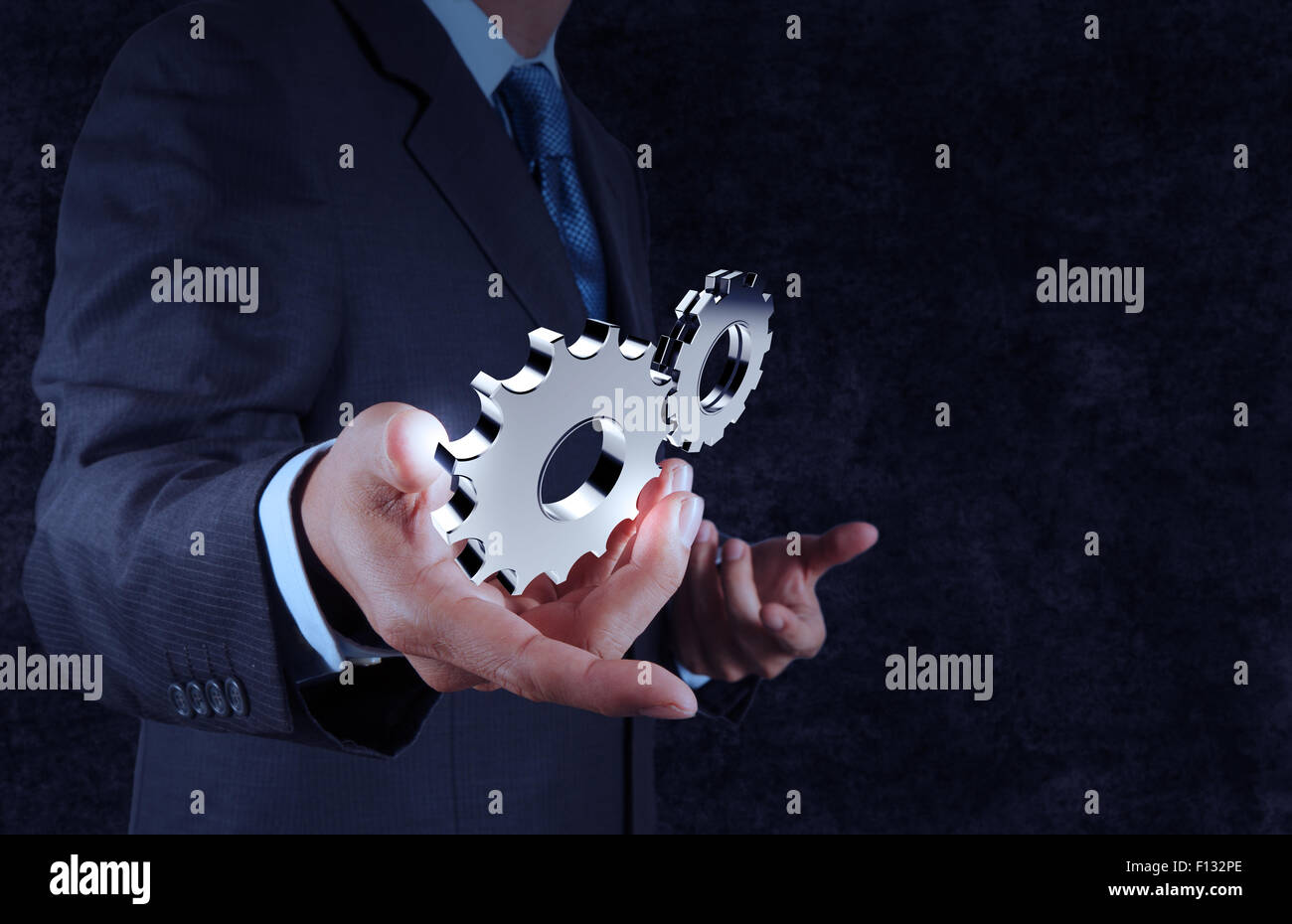 businessman hand draws gear to success concept Stock Photo - Alamy