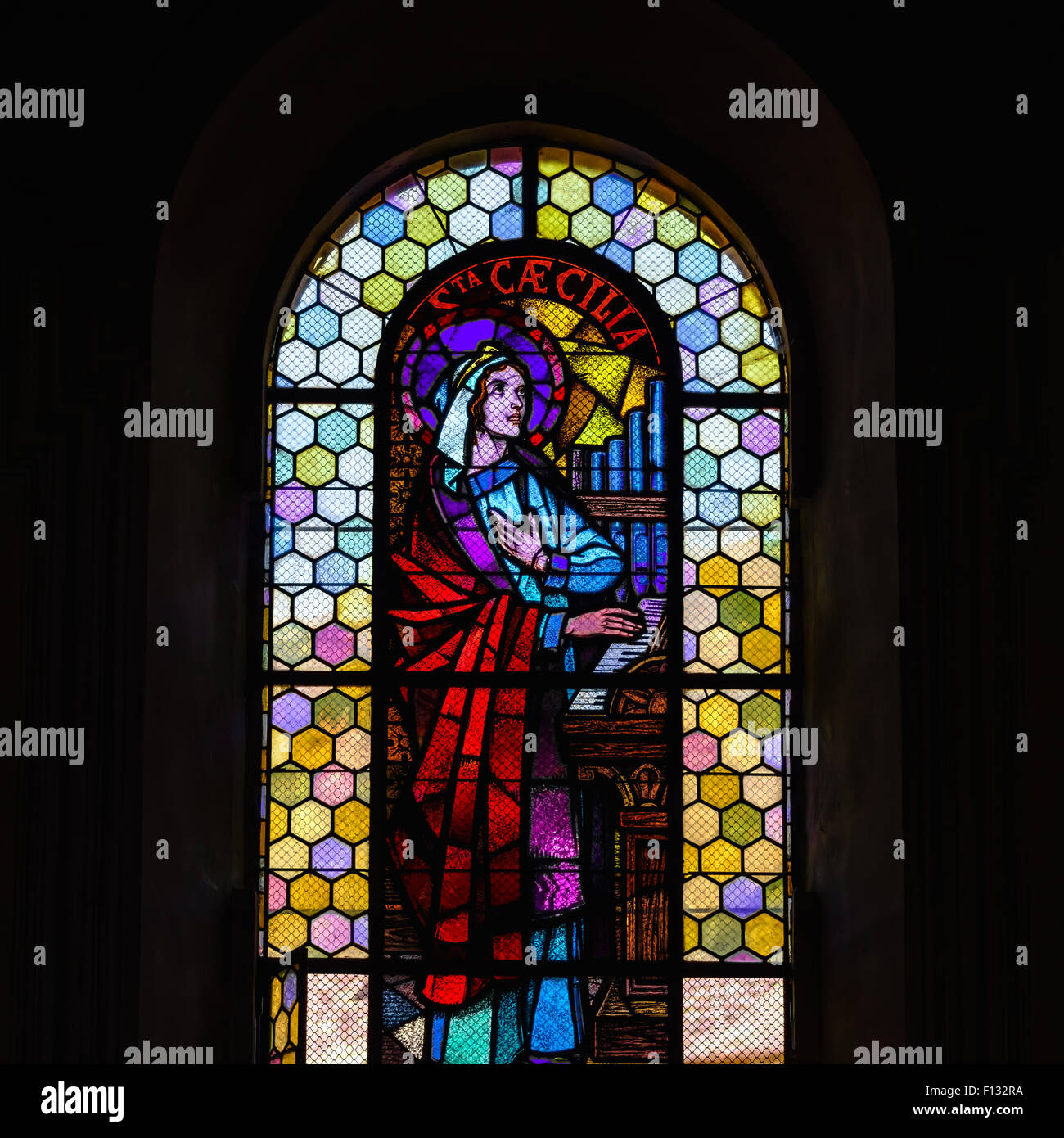 Sun lighting through the medieval leaded pane in old Saint Paul and ...