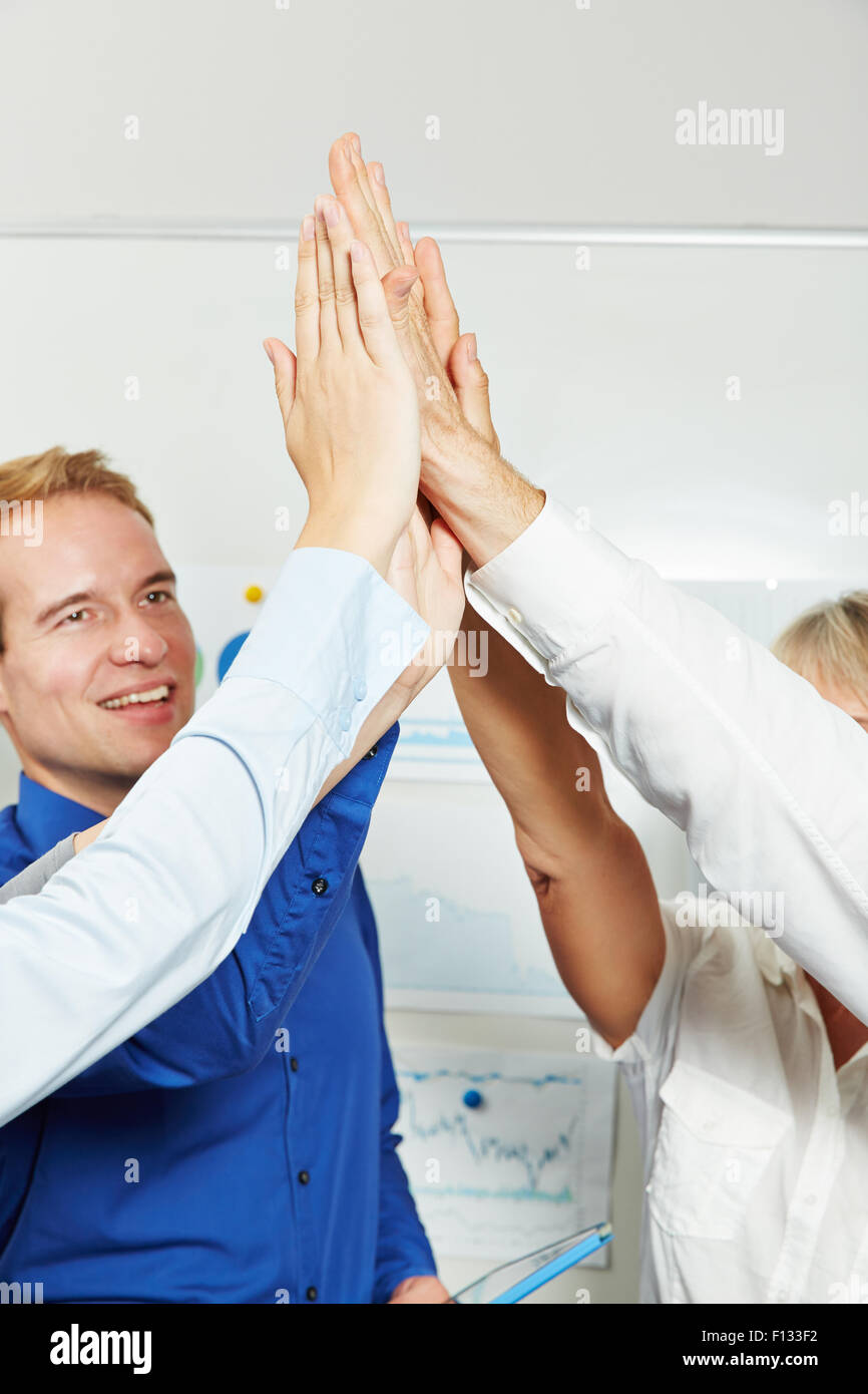 Office high five hi-res stock photography and images - Alamy