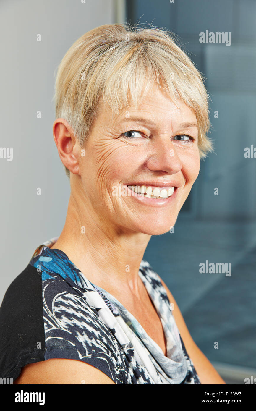 Old senior woman smiling happily into the camera Stock Photo - Alamy Old senior woman smiling happily into the camera Stock Photo - Alamy
