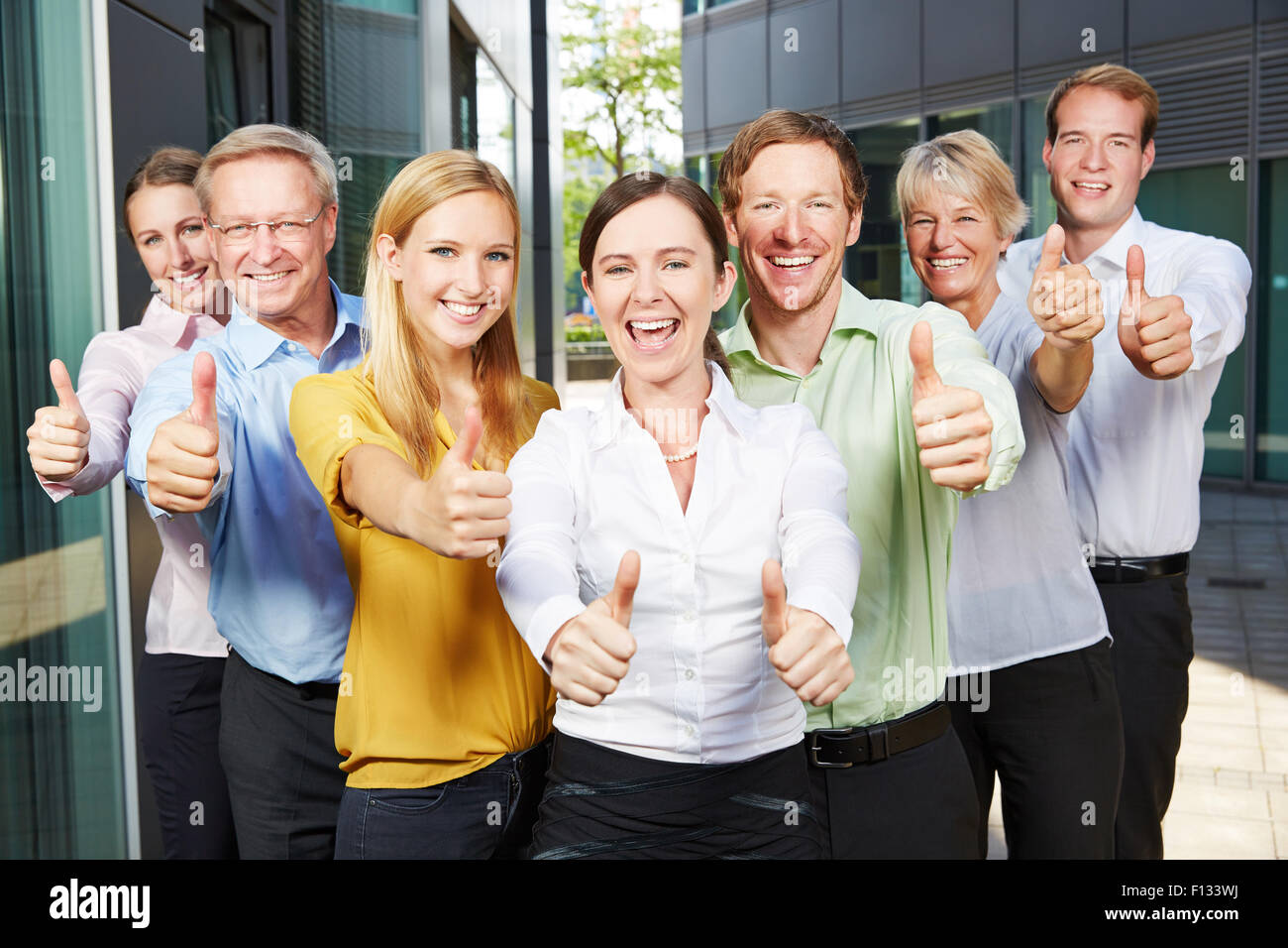 Winning and cheering business people team holding many thumbs up Stock ... Winning and cheering business people team holding many thumbs up Stock ...