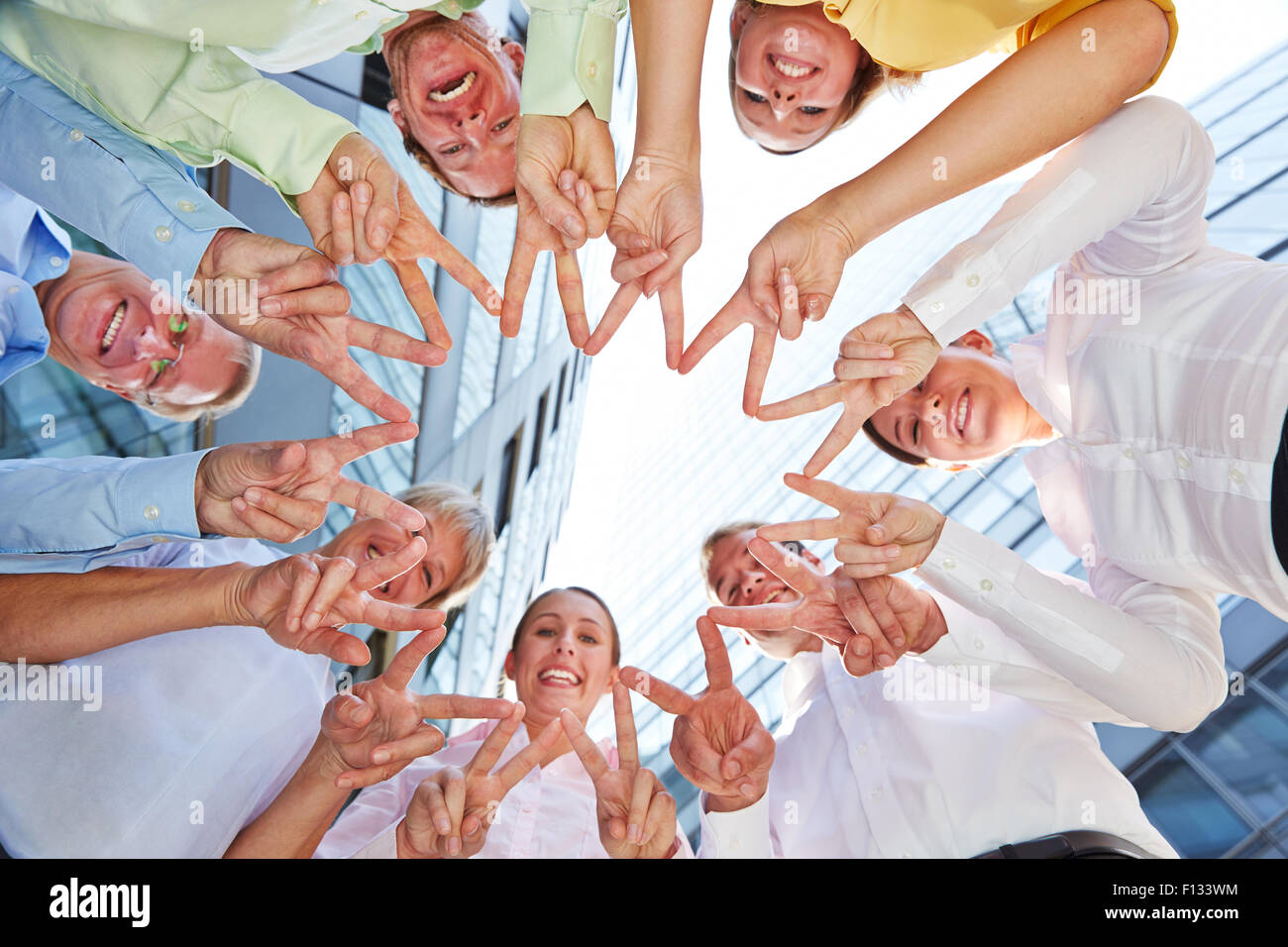 Happy business people team forming a star with their hands Stock Photo ...