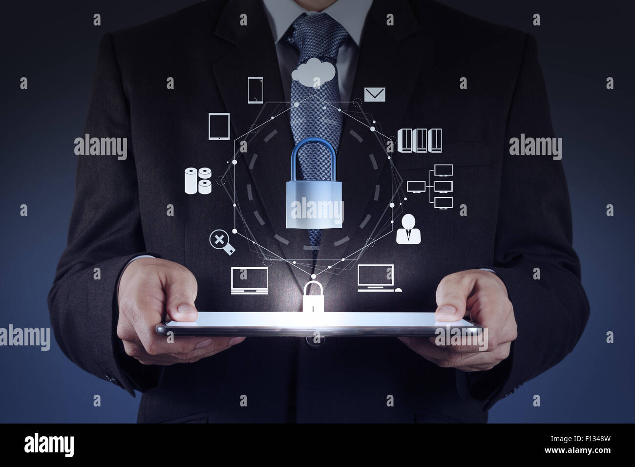 businessman hand pointing to padlock on touch screen computer as ...