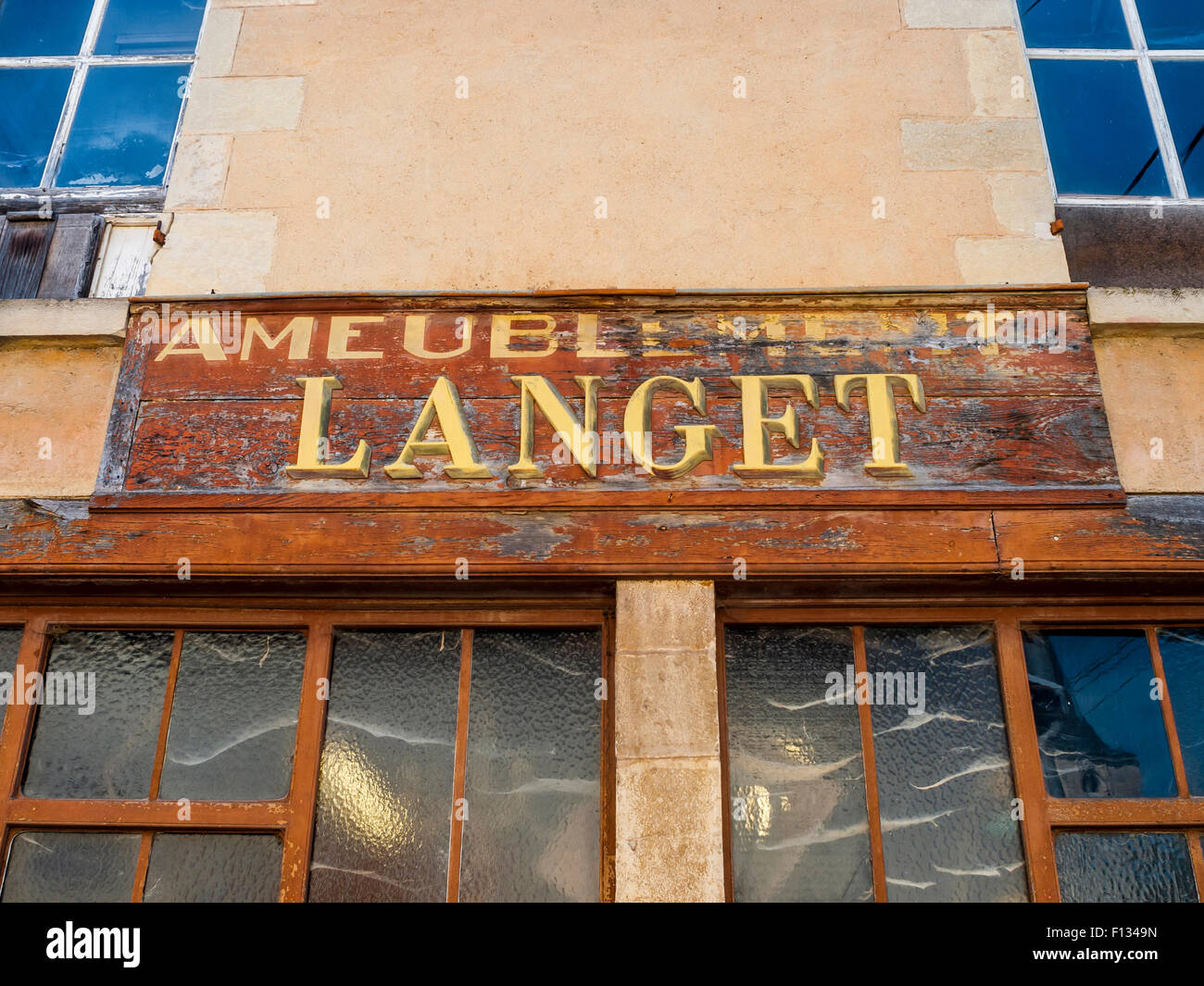Old faded shop sign, Yonne, France Stock Photo - Alamy