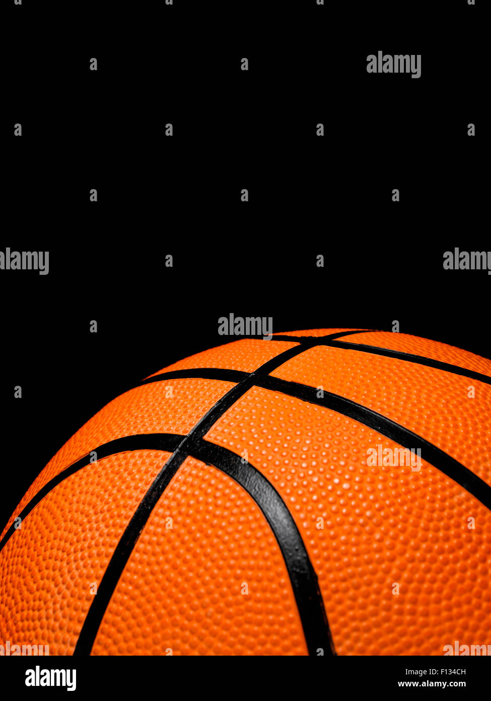 Single Basketball on a black background Stock Photo - Alamy