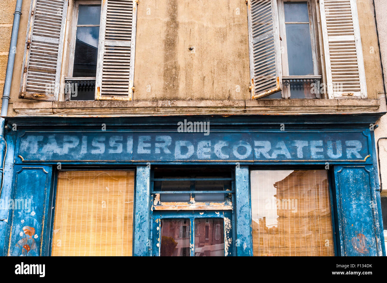 Old faded shop signs, Yonne, France Stock Photo - Alamy