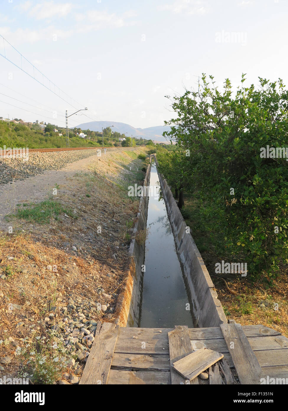 Water flowing through irrigation system in Alora lemon grove Stock ...
