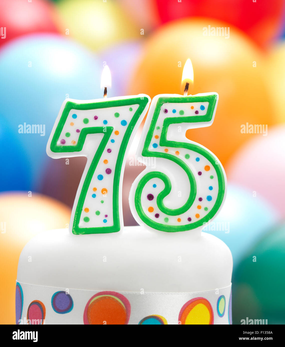 Candle with balloon party background Stock Photo - Alamy