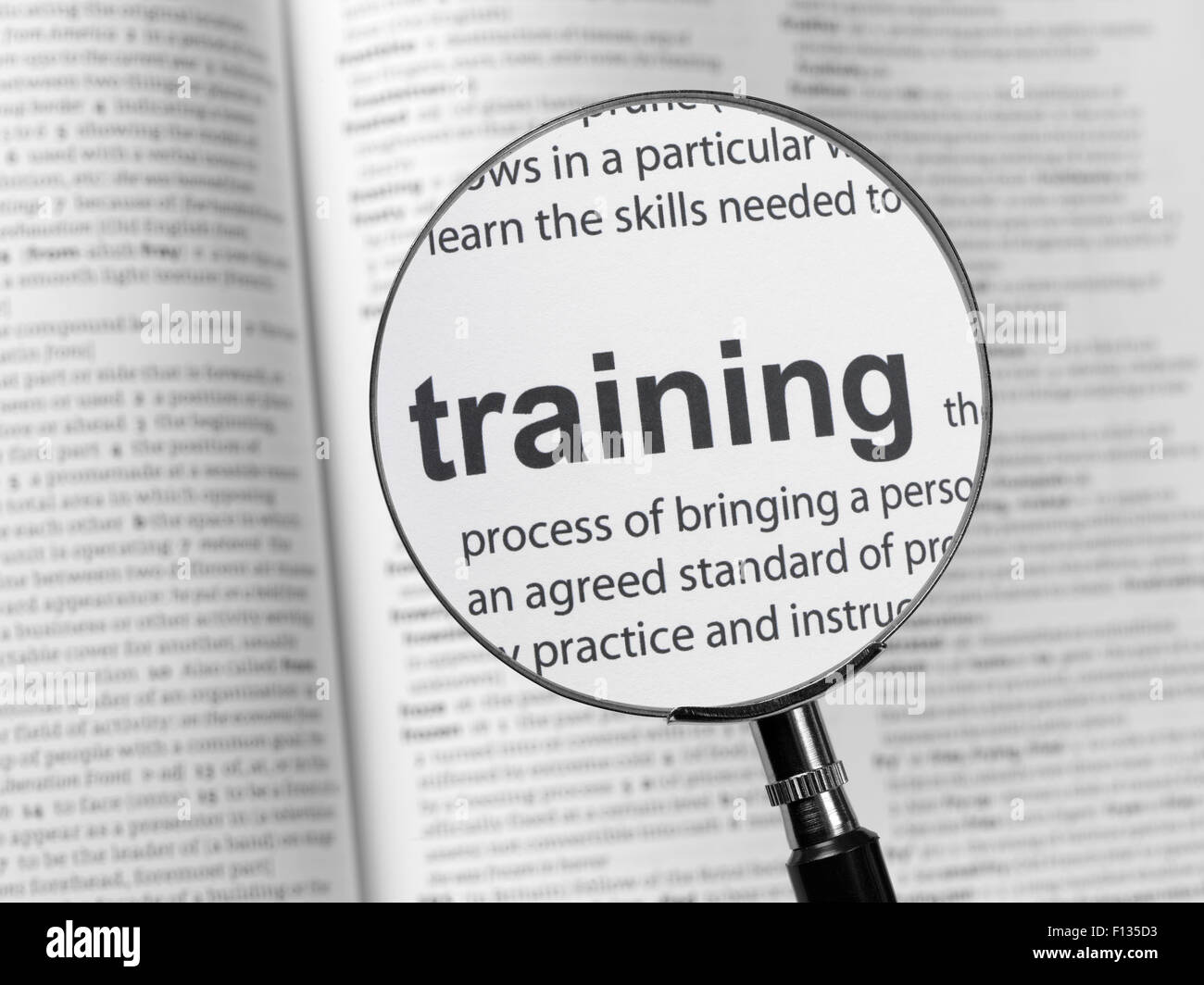 Dictionary highlighting Training Stock Photo - Alamy