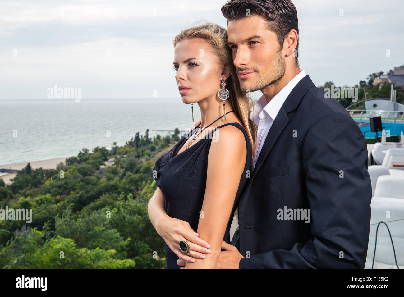 Romantic couple standing restaurant hi-res stock photography and images ...