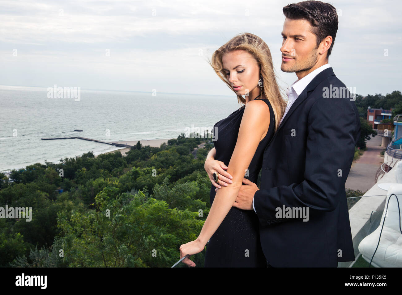 Romantic couple standing restaurant hi-res stock photography and images ...