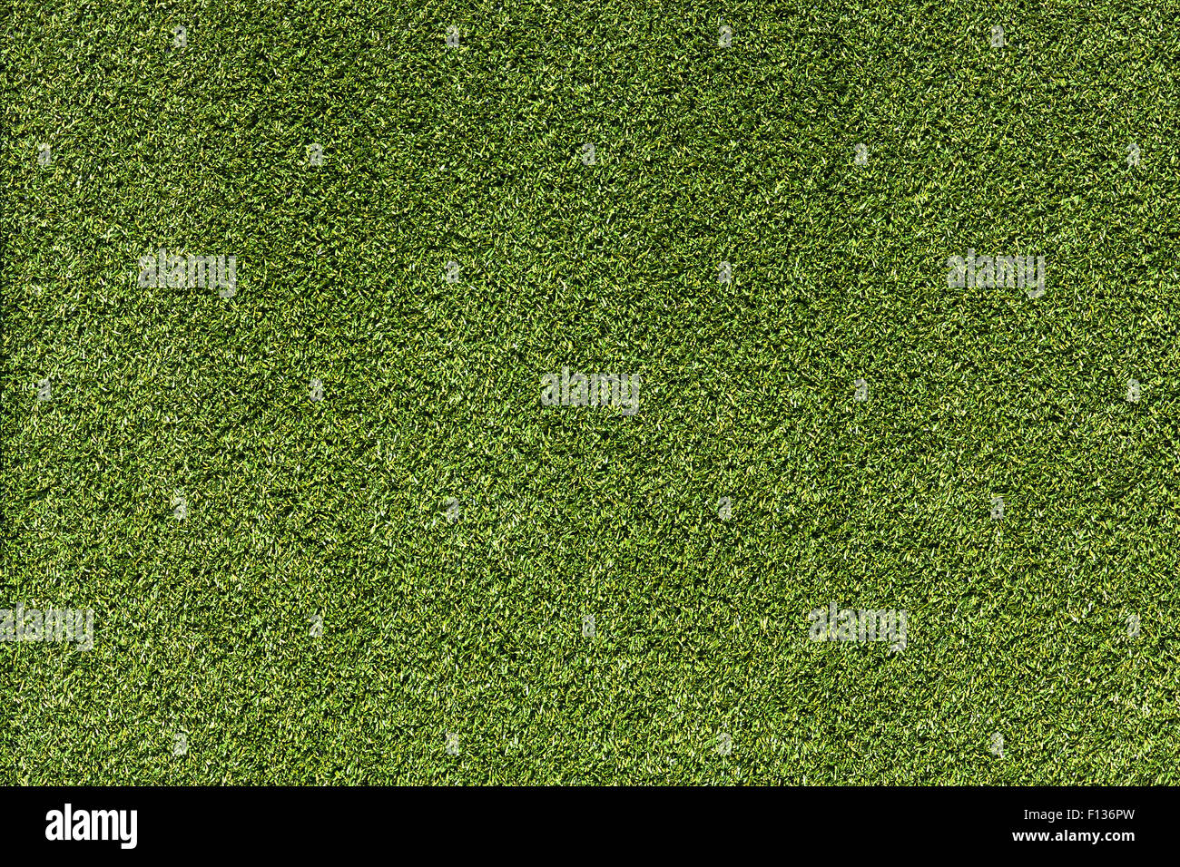 Artificial Grass Field background and Texture Stock Photo - Alamy