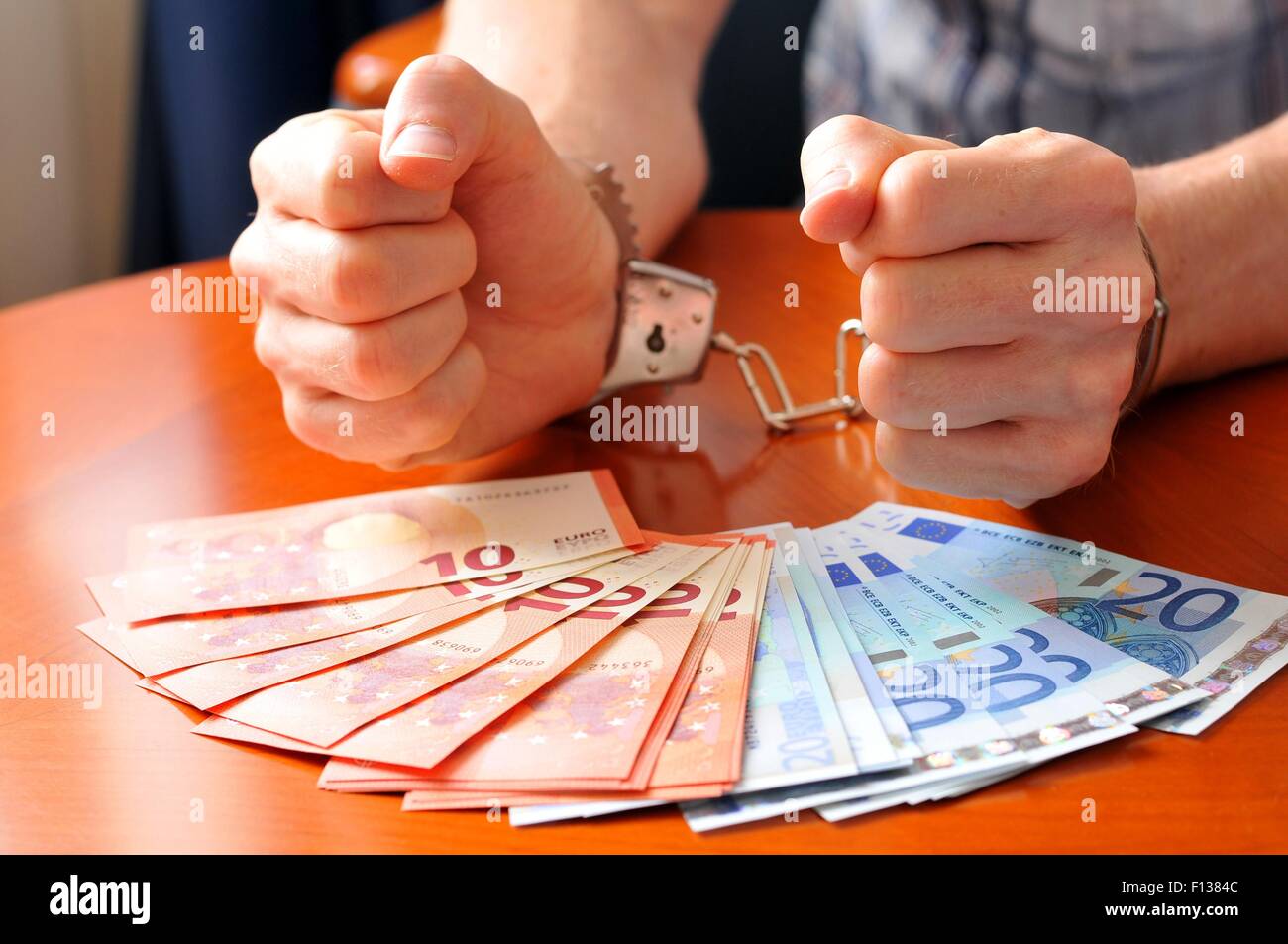 Europe police handcuffs black hi-res stock photography and images - Alamy