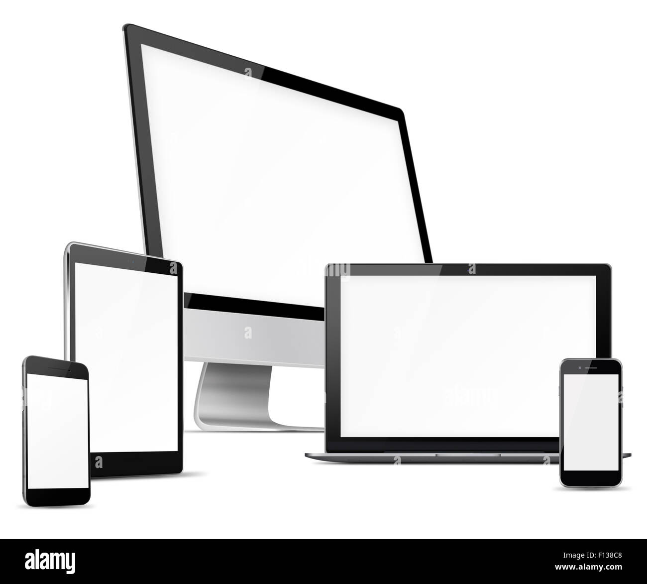 Computer monitor, mobile phone, laptop and tablet pc with blank screen ...