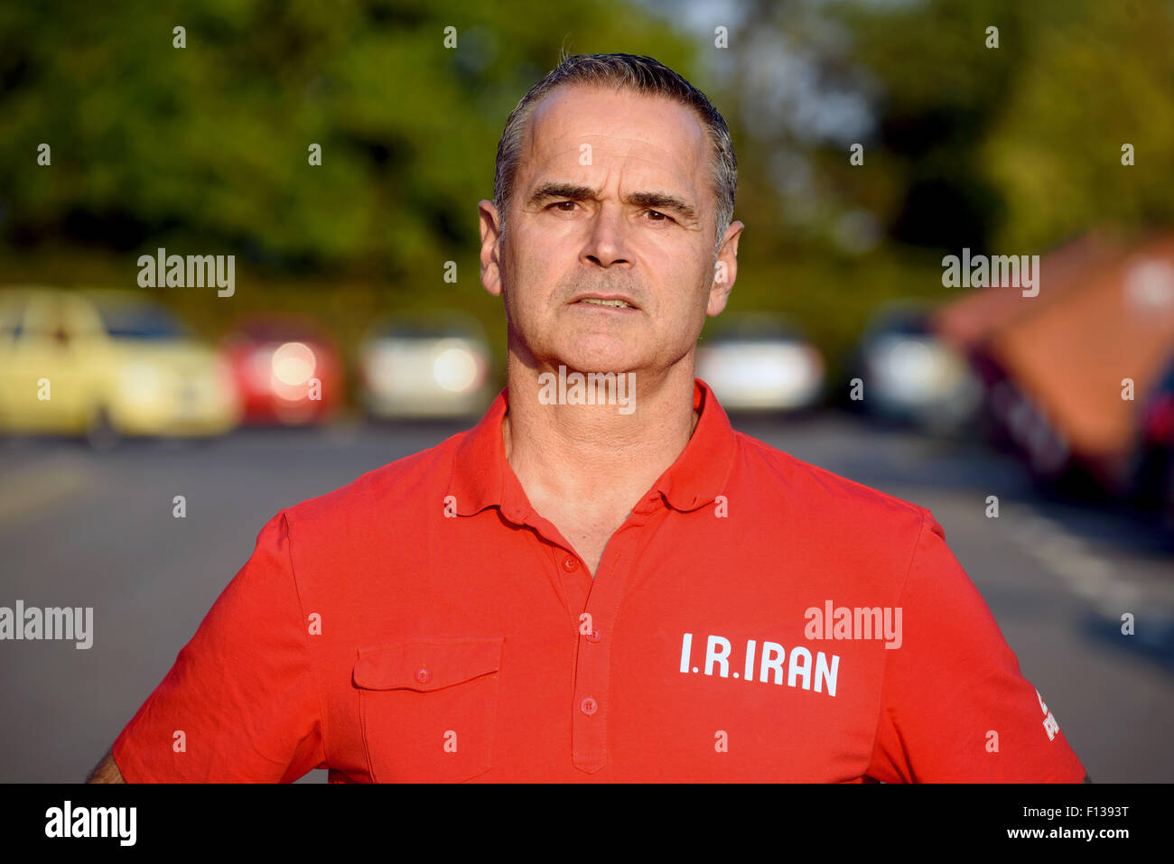 Dirk Bauermann, coach of Iran's national basketball team, poses in ...