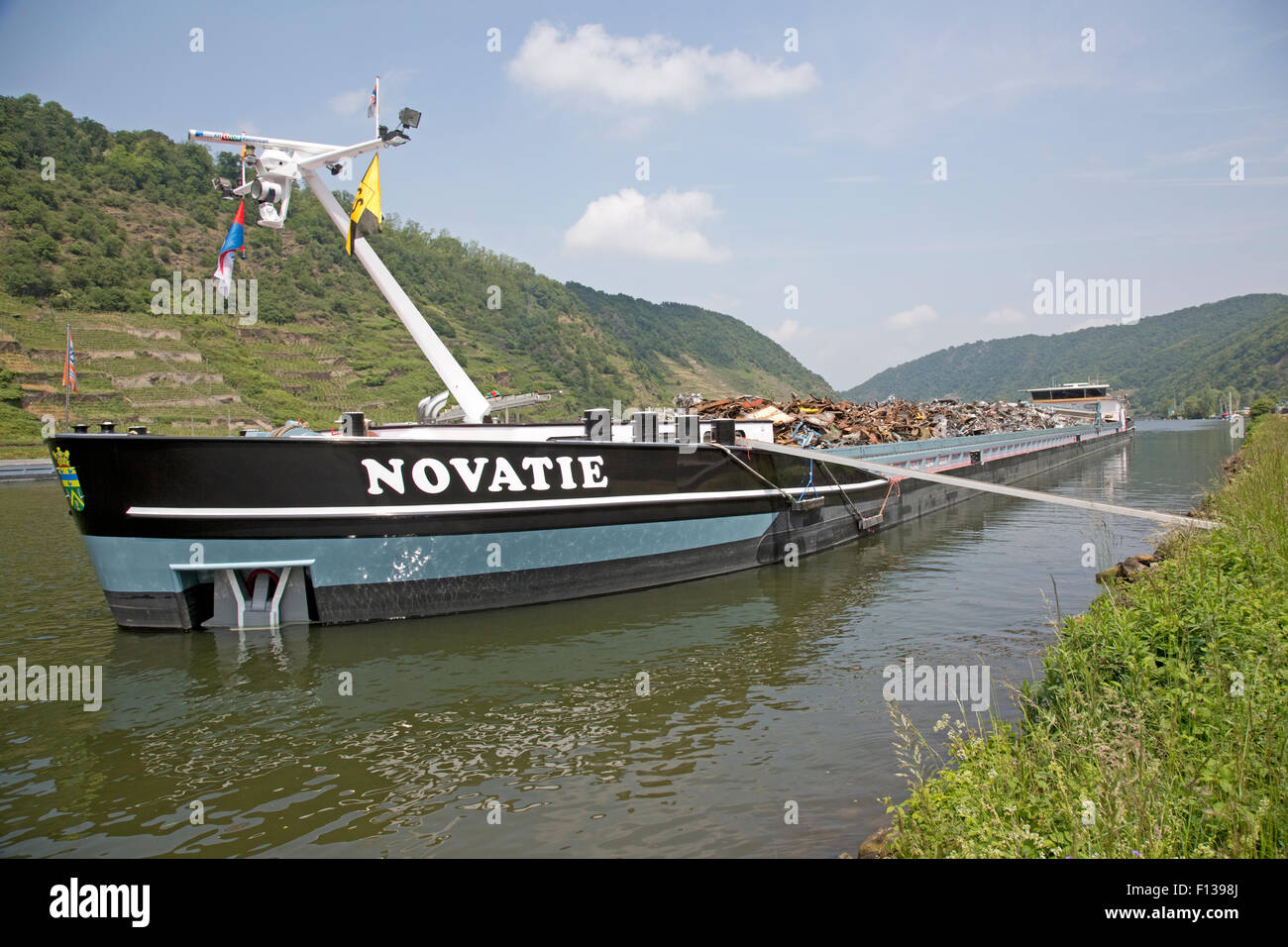 Large barge transporting scrap metal Hatzenport Mosel River Germany ...