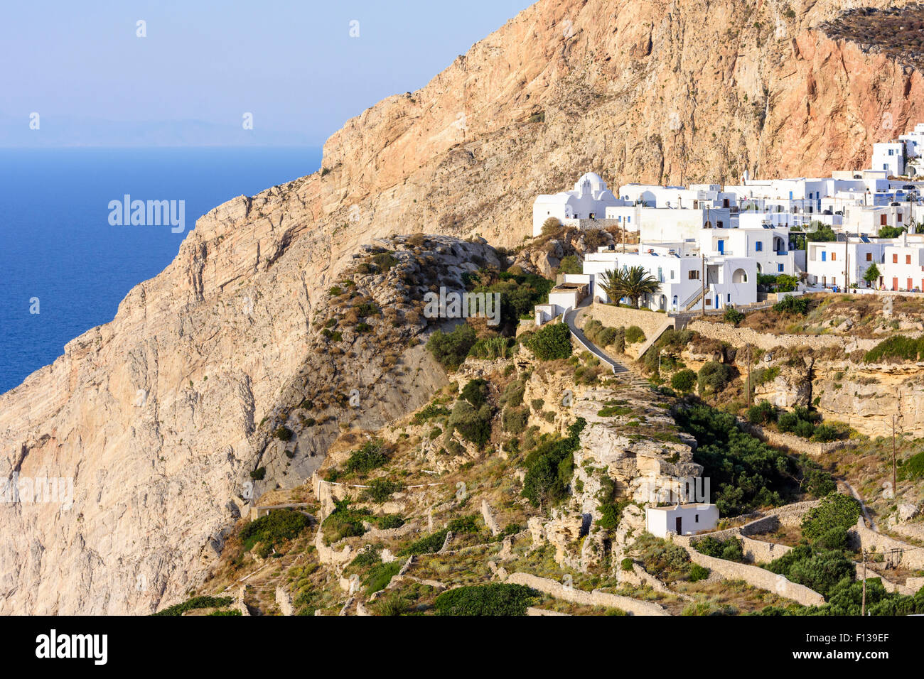 Cliff top whitewashed buildings in the Chora, Folegandros, Cyclades ...