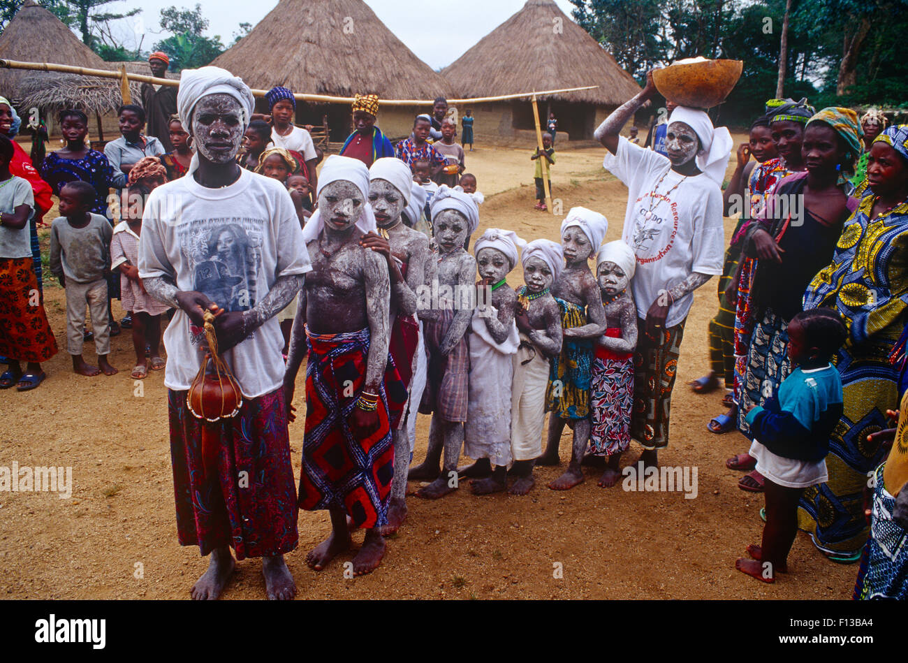 Young girls in traditional dress undergoing secret society initiations ...