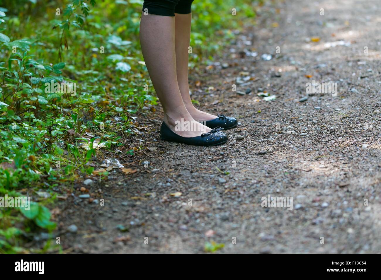 Close up of girl legs walking in forest. Close up of body part Stock ...
