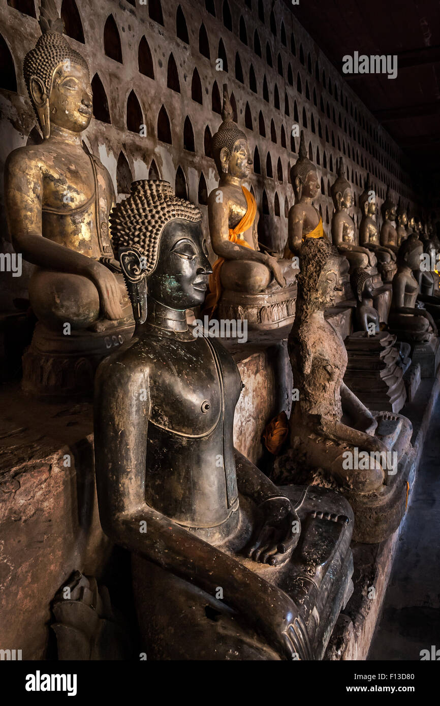 Ancient Buddha Statues in a temple, Laos Stock Photo - Alamy