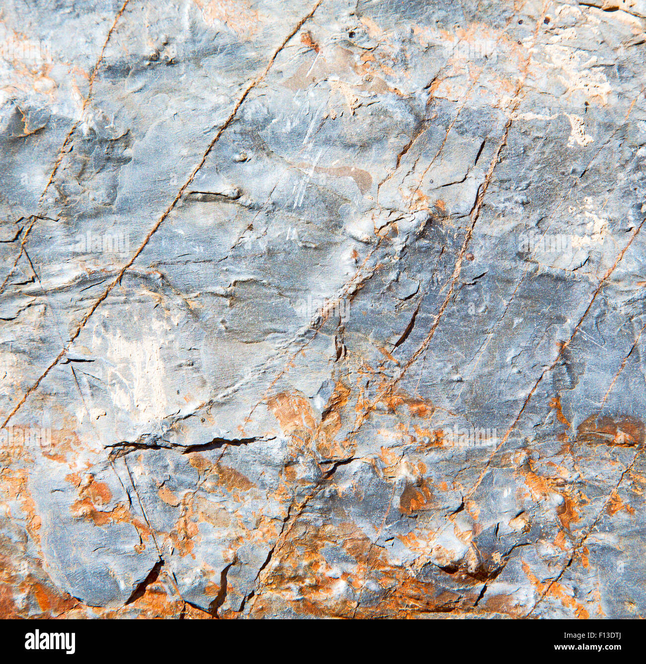 rocks stone and red orange gneiss in the wall of morocco Stock Photo ...