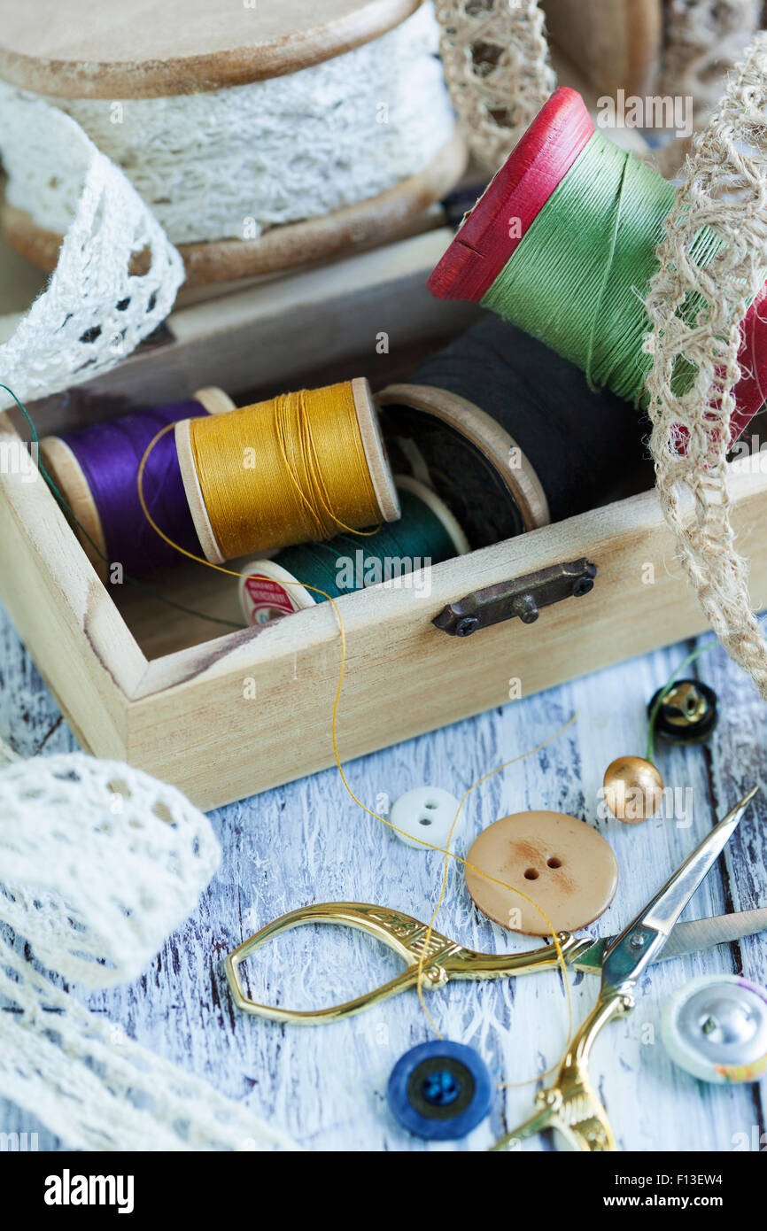 Tools for needlework, thread, scissors, buttons and vintage laces Stock ...