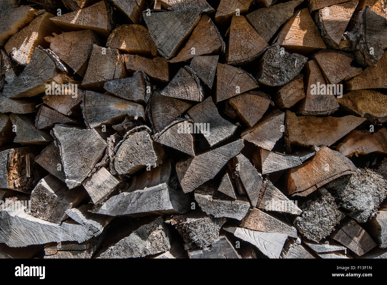 Patterns in axe cut timber logs Stock Photo - Alamy