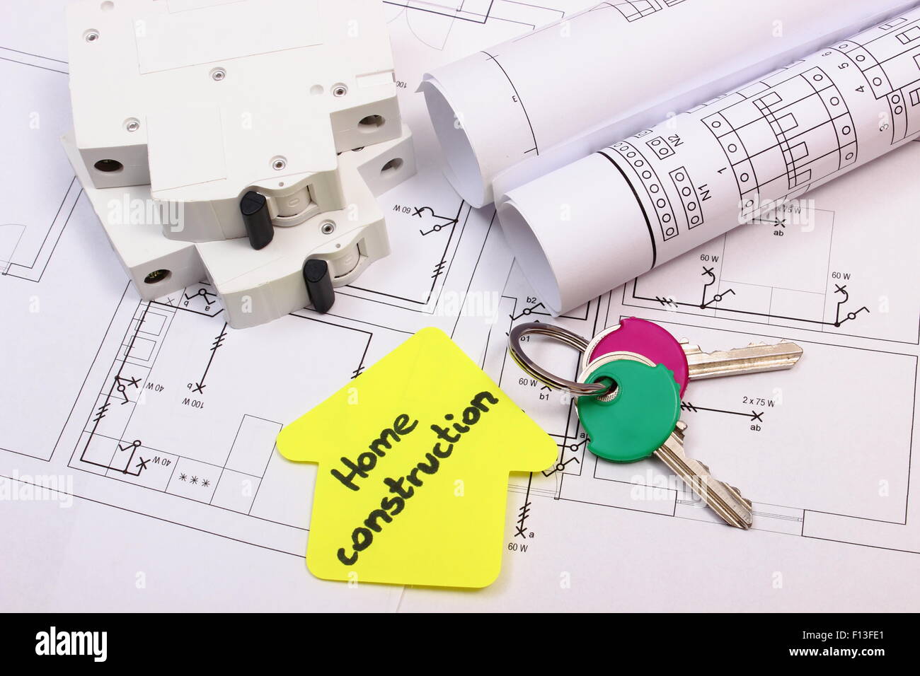 House of yellow paper, home keys, rolls of diagrams and electric fuse ...