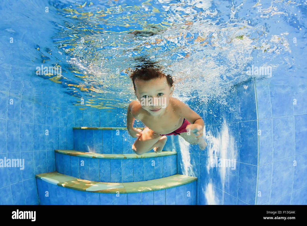 Baby swimming underwater hi-res stock photography and images - Alamy