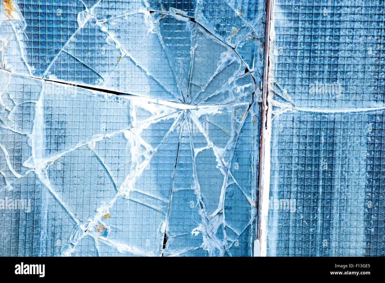 Shattered security glass Stock Photo - Alamy