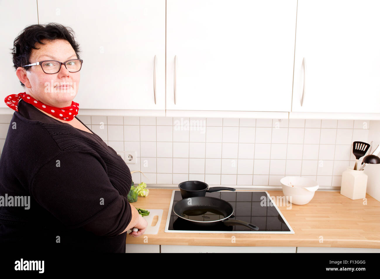 Overweight healthy cooking woman hi-res stock photography and images ...