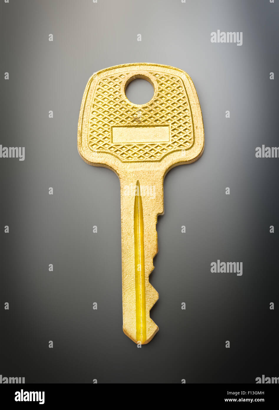 One old steel key vertical in closeup Stock Photo - Alamy