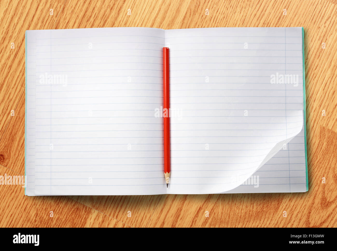 White blank open notebook with red pencil Stock Photo - Alamy