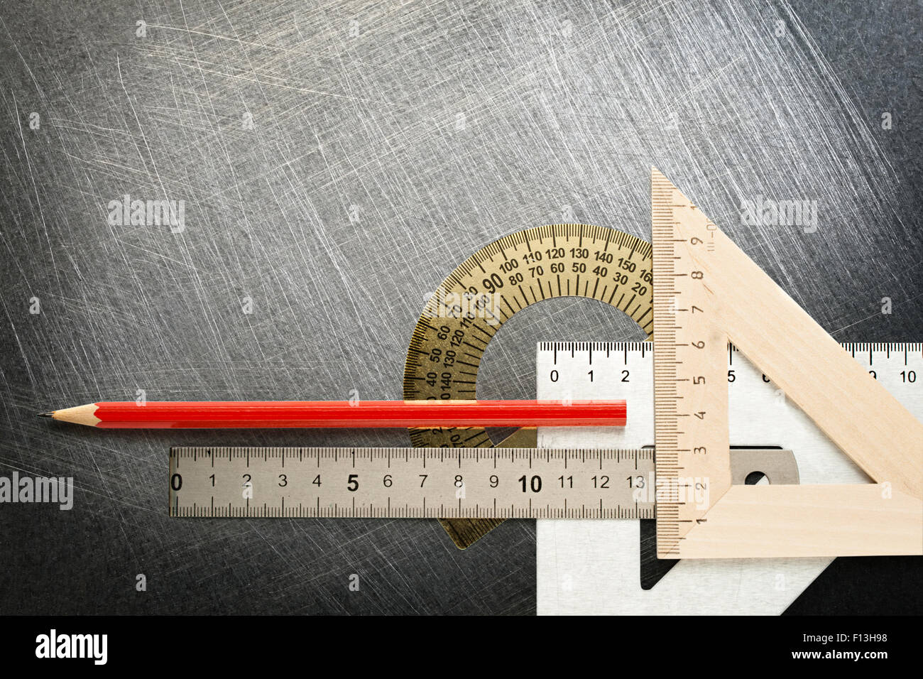 Drafting wooden and steel tools with pencil Stock Photo - Alamy