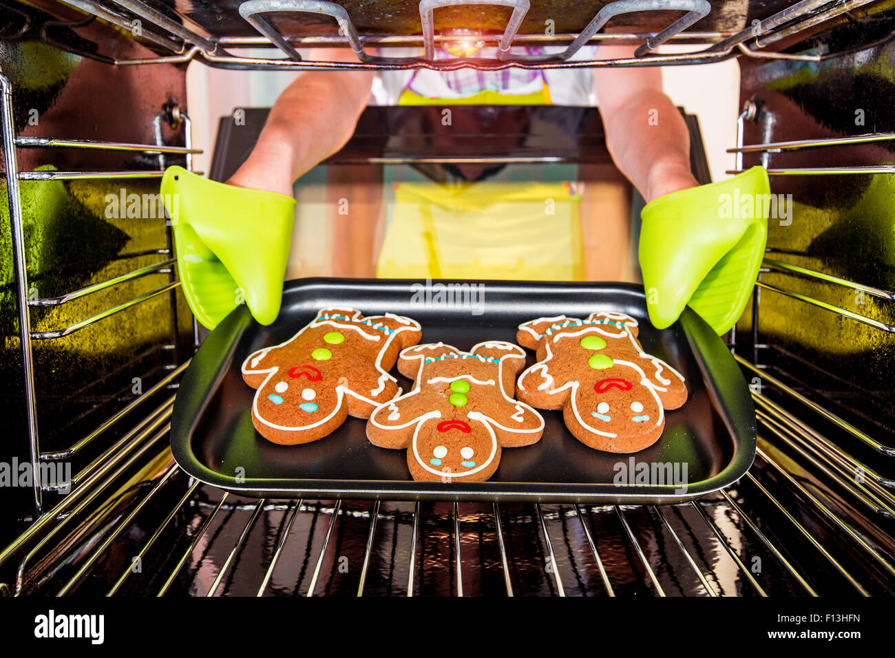 Baking Gingerbread man in the oven, view from the inside of the oven ...