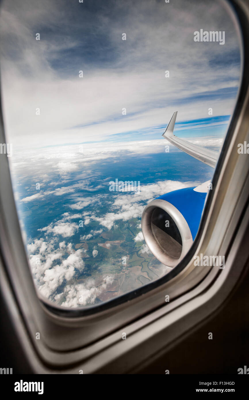 Classic image through aircraft window onto jet engine Stock Photo - Alamy