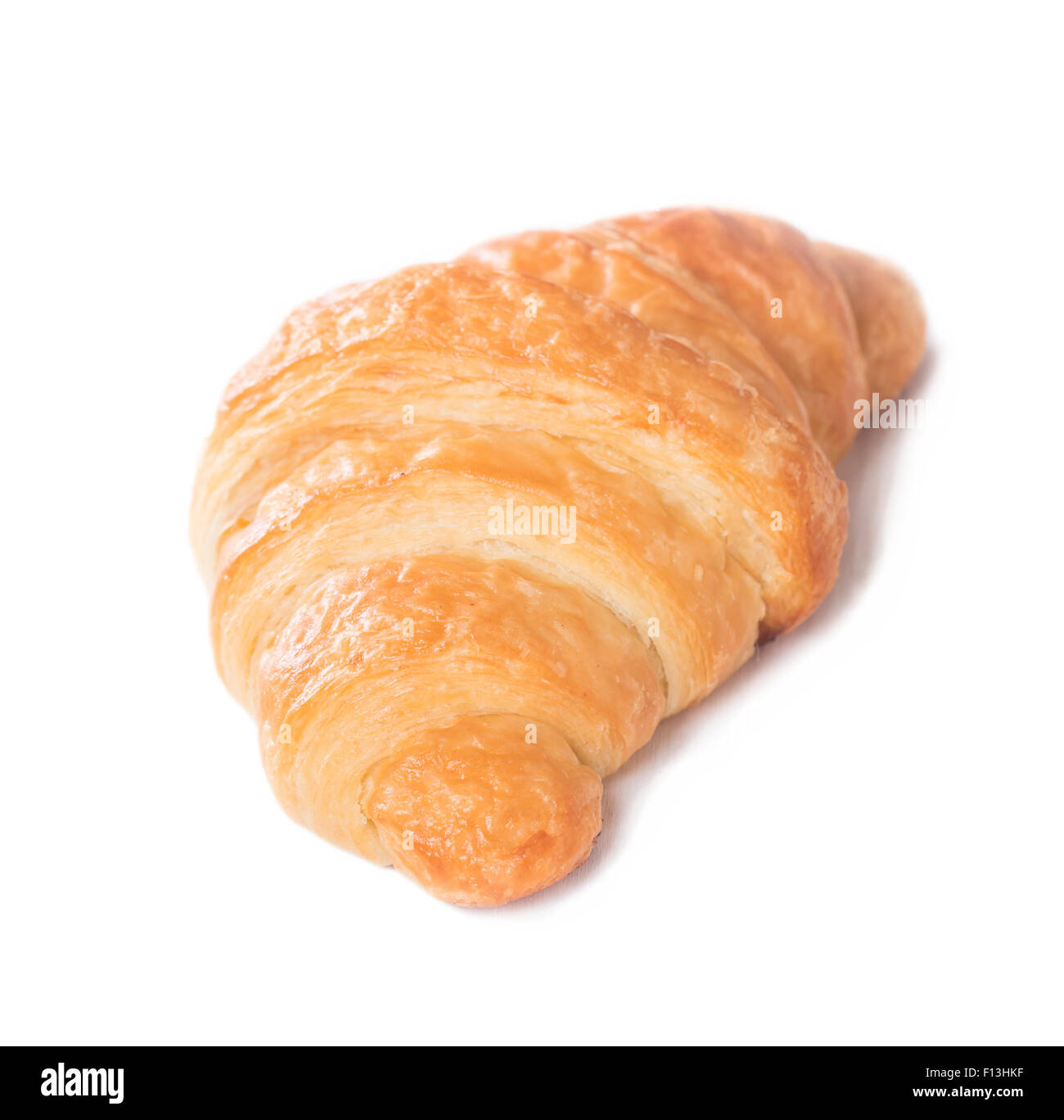 Fresh and tasty croissant on white background Stock Photo - Alamy