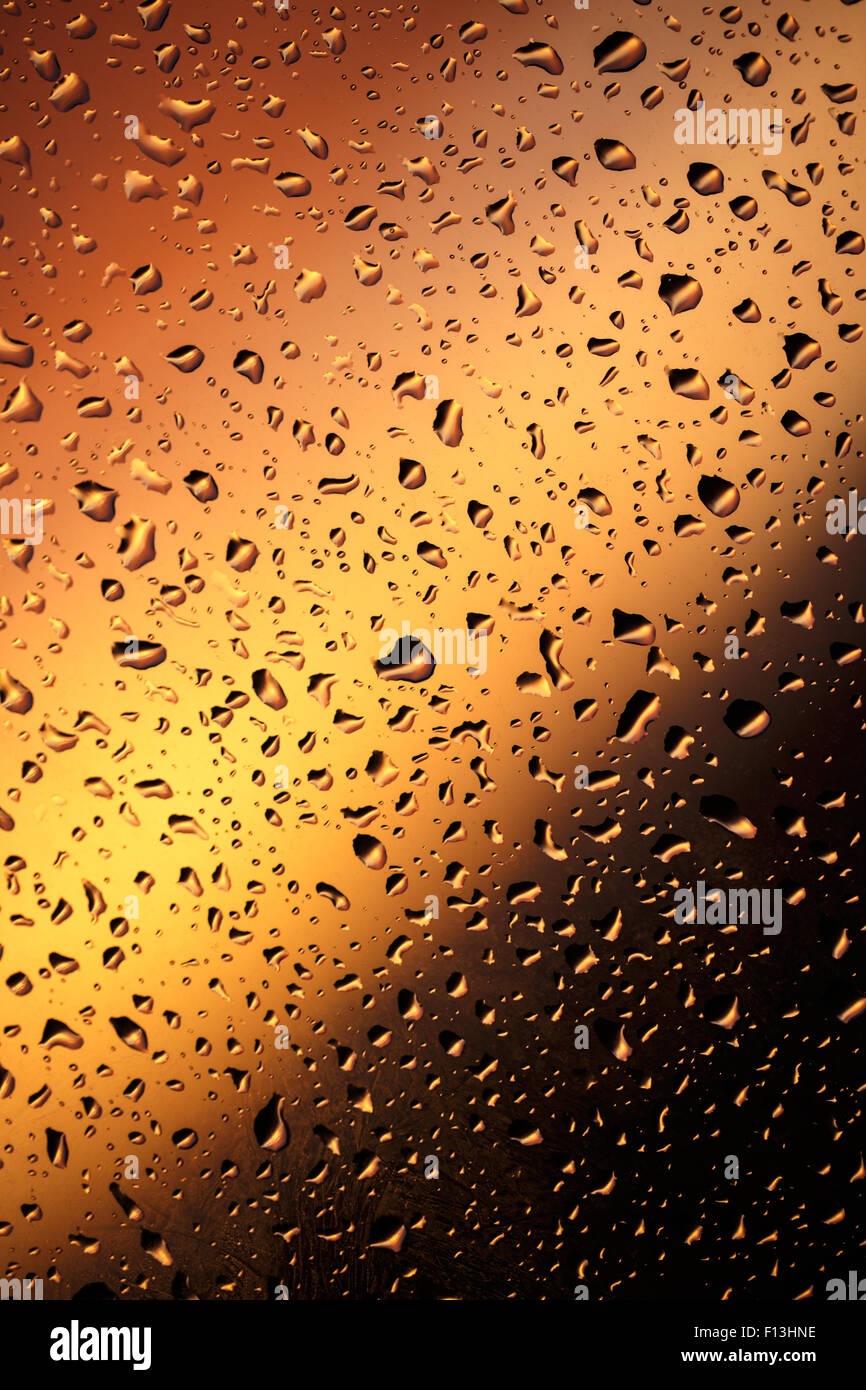 Cold rain drops on window as background Stock Photo - Alamy
