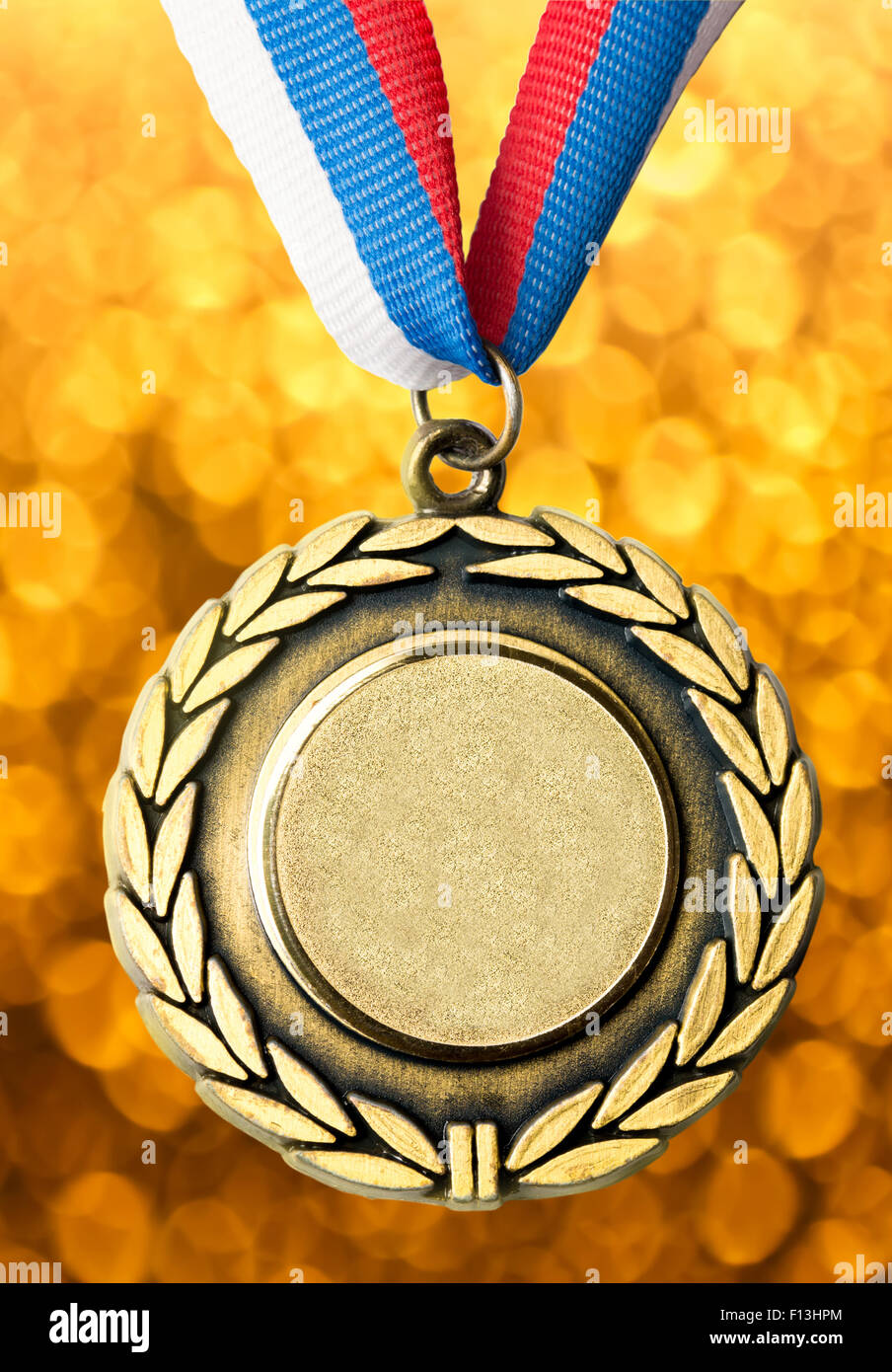 Metal medal with tricolor ribbon in closeup Stock Photo - Alamy
