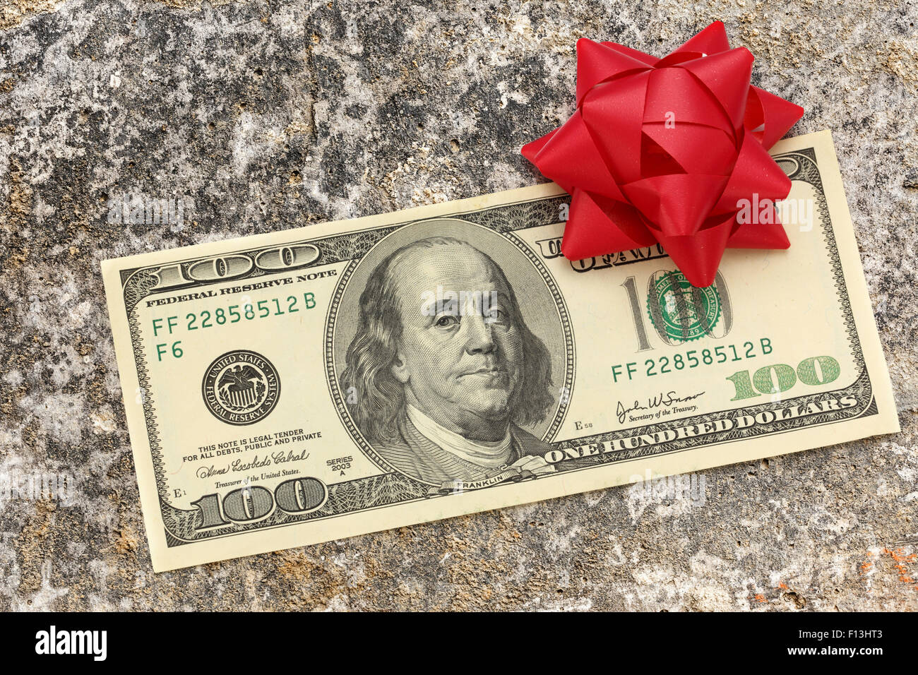 Dollar banknote with decorative bow in closeup Stock Photo - Alamy