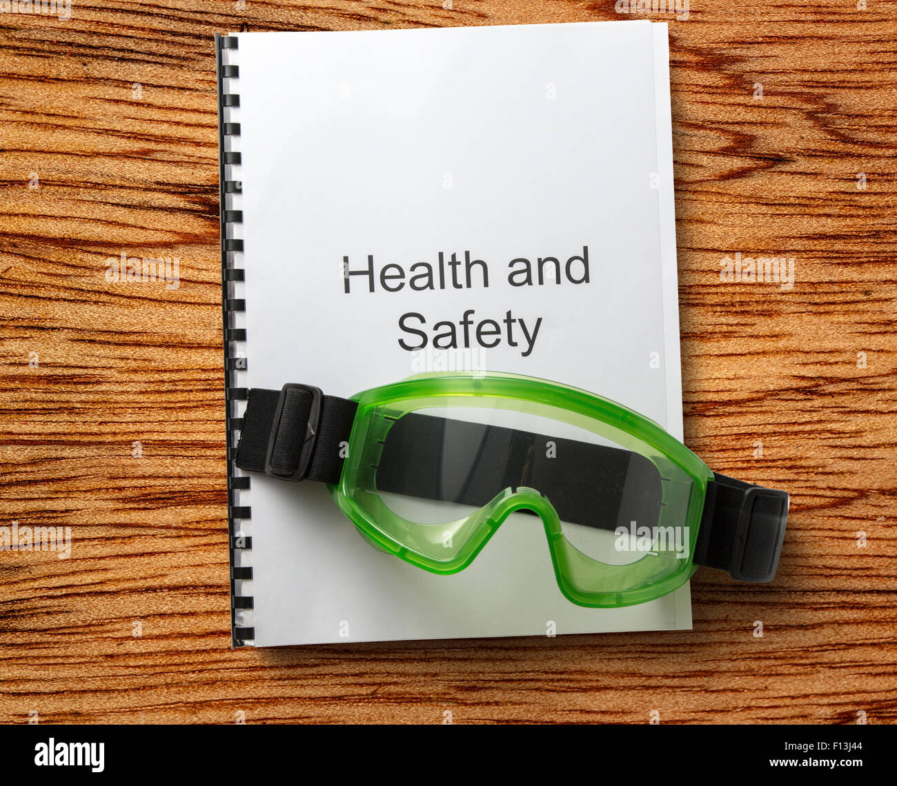 Health and safety register with goggles in closeup Stock Photo - Alamy