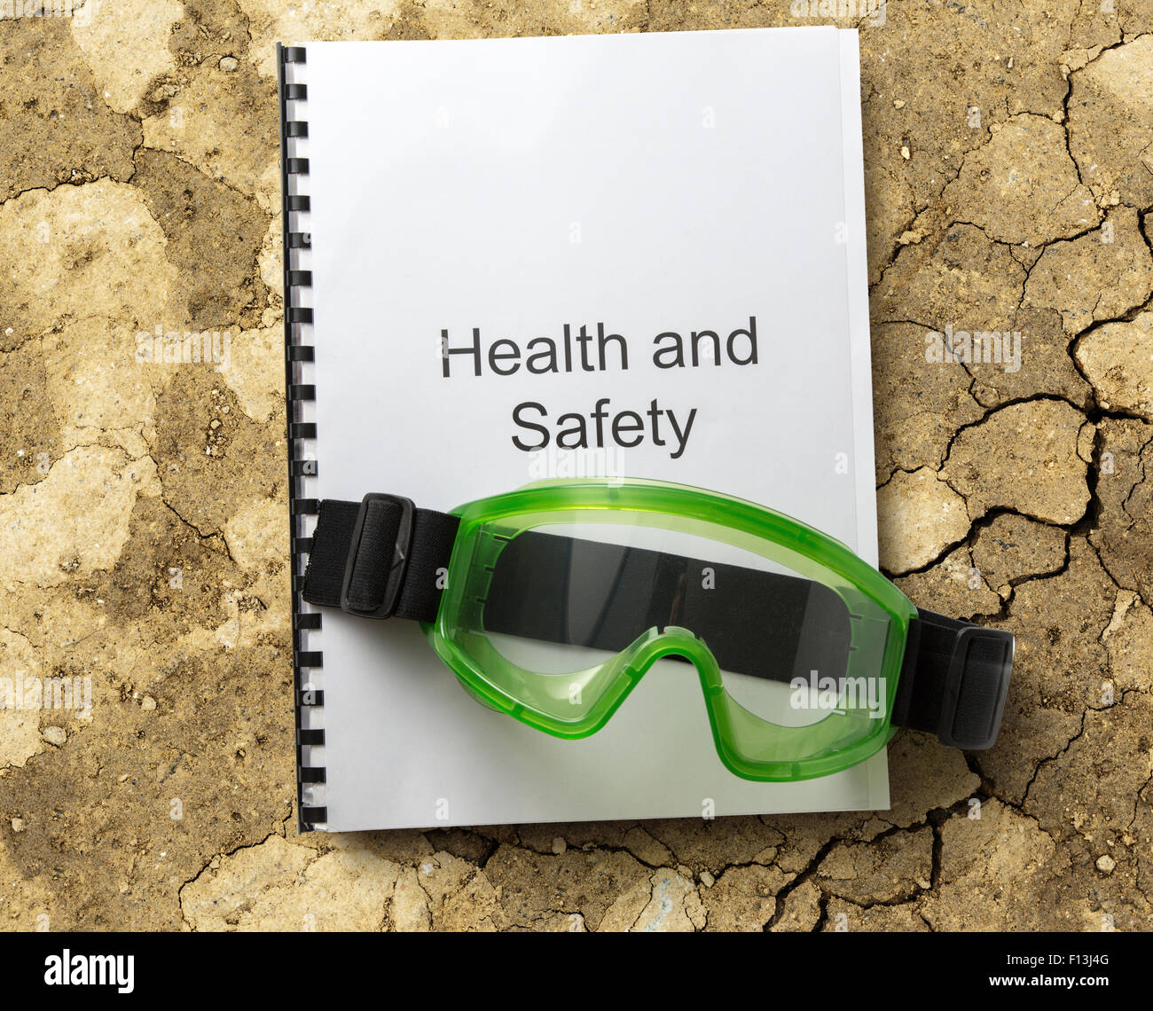 Health and safety register with goggles in closeup Stock Photo - Alamy
